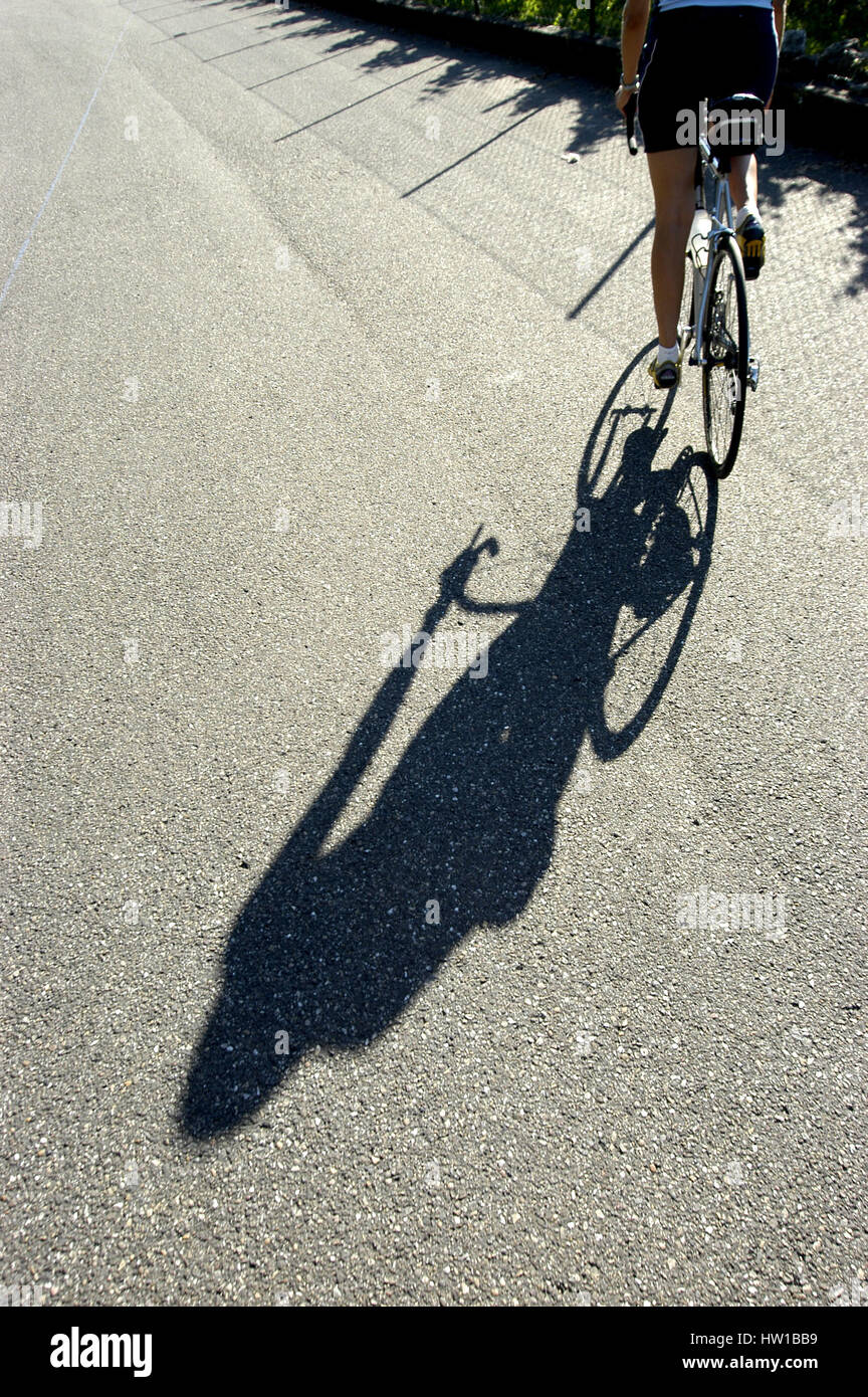 Shades of a cyclist , Schatten eines Radfahrers Stock Photo - Alamy