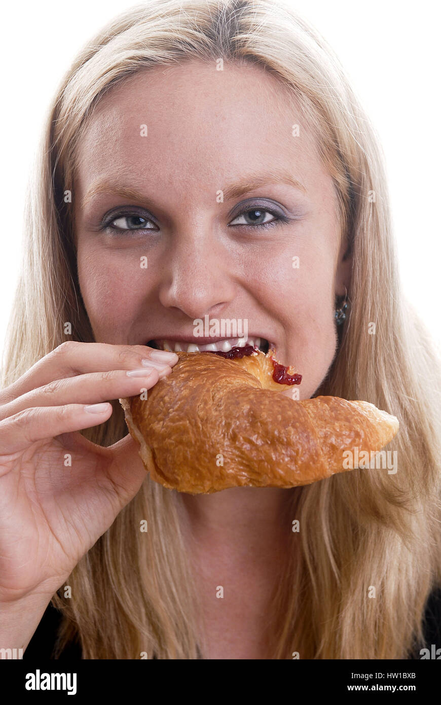 Croissant eat, Croissant essen Stock Photo - Alamy