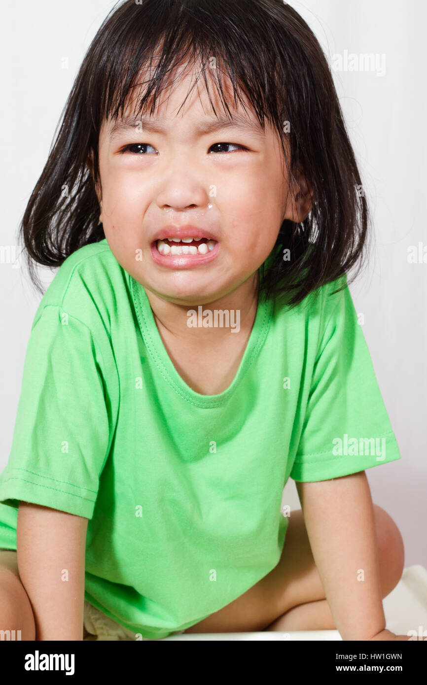 Little Asain Chinese Crying in white background Stock Photo - Alamy