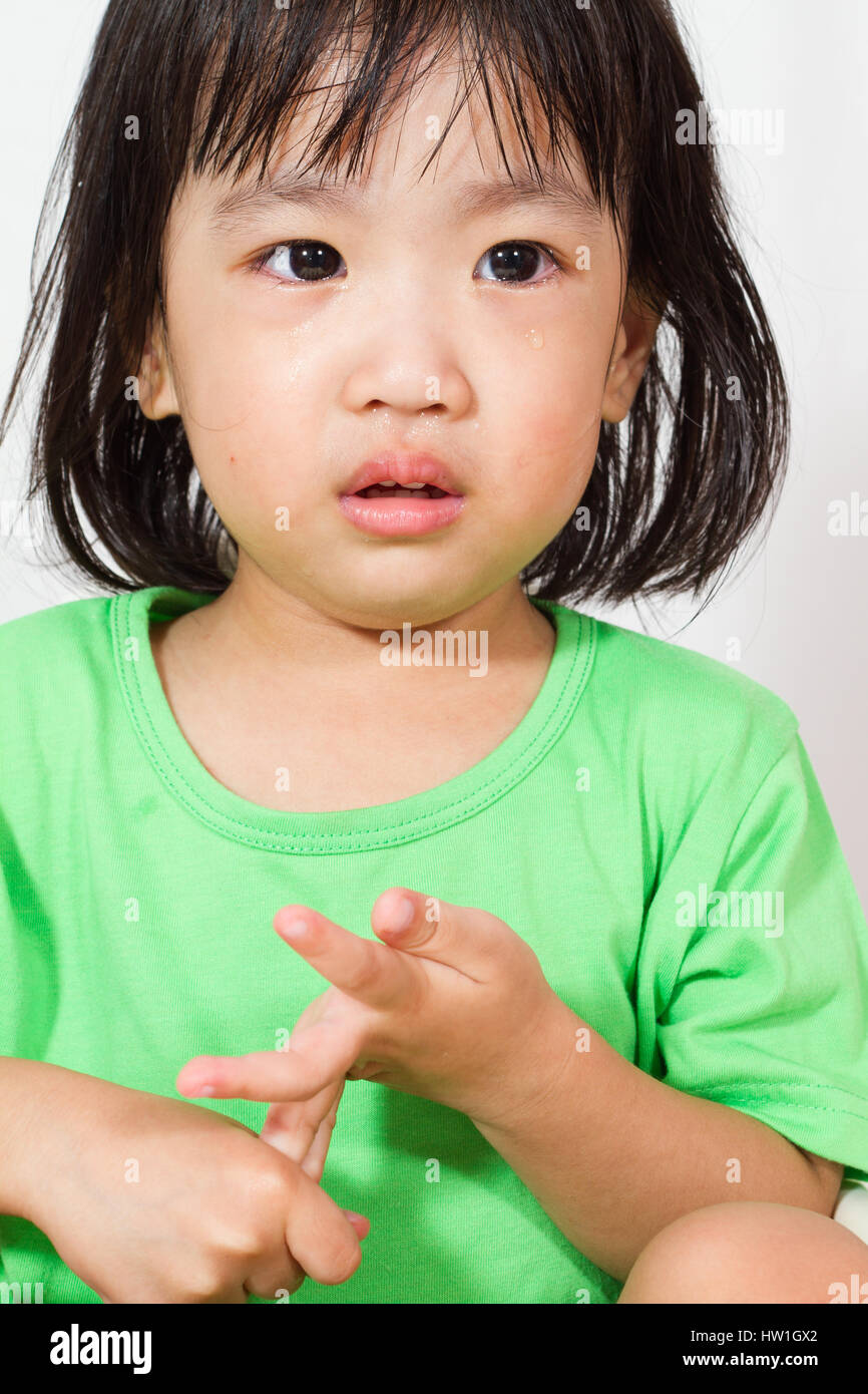 Little Asain Chinese Crying in white background Stock Photo - Alamy