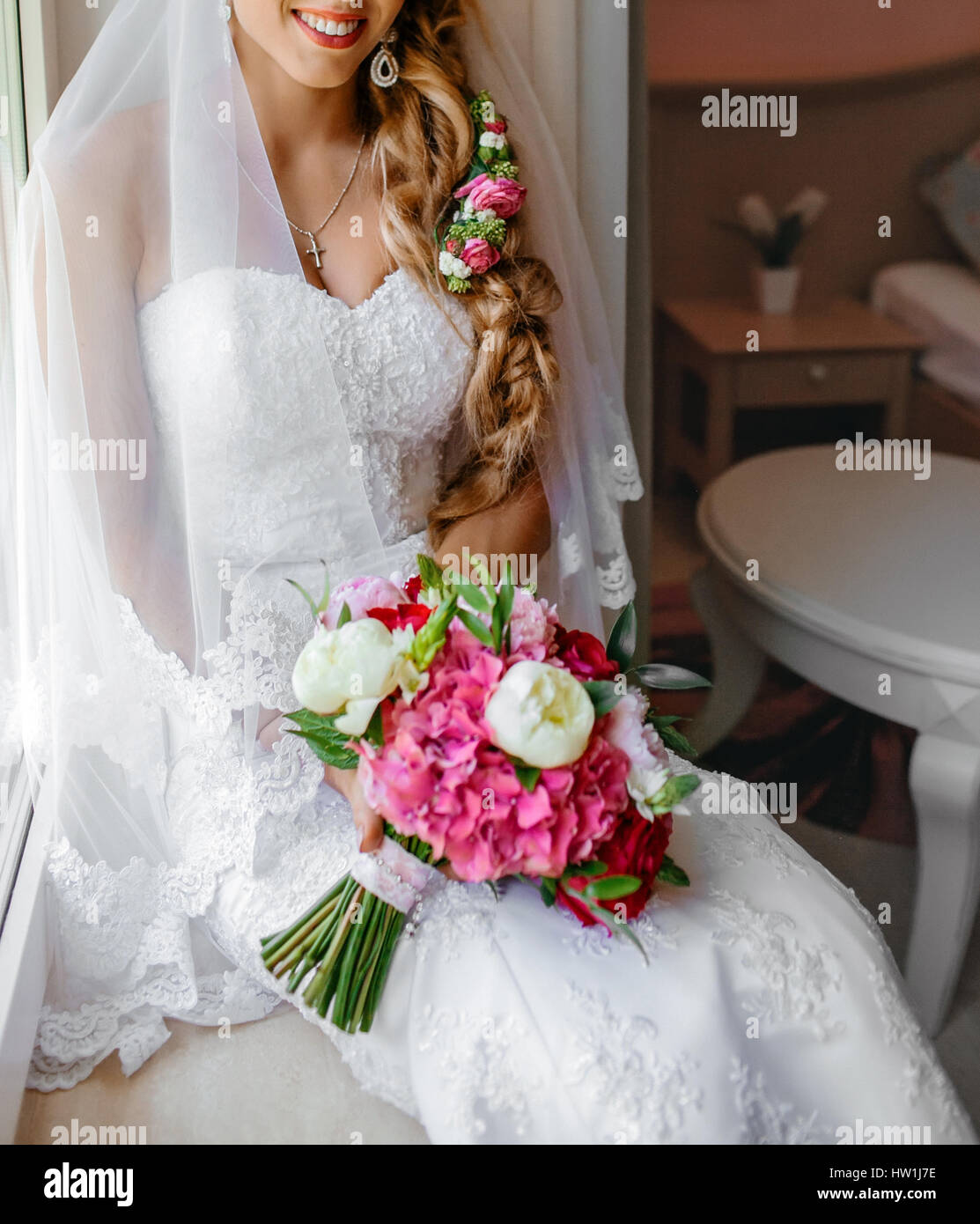 Bride holding delicate marriage bouquet Stock Photo - Alamy