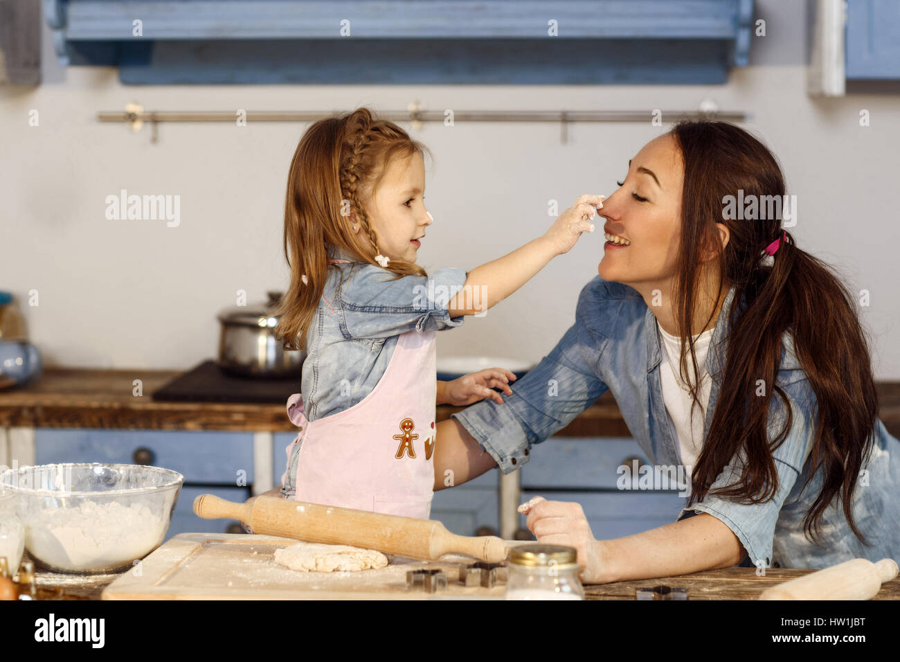 Mother's little helper Stock Photo - Alamy