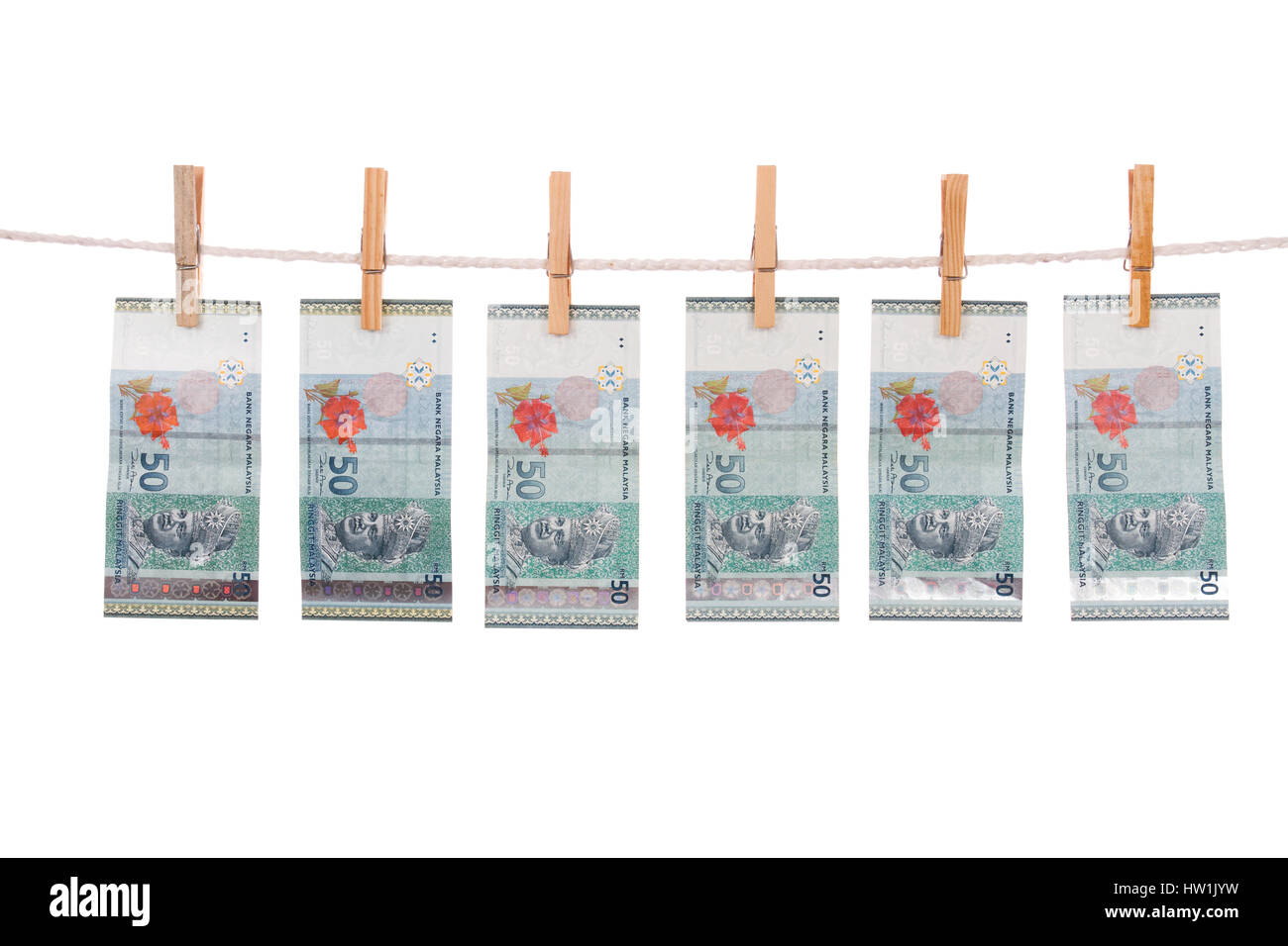 Money laundering concept with Ringgit Malaysia notes on clothesline in ...