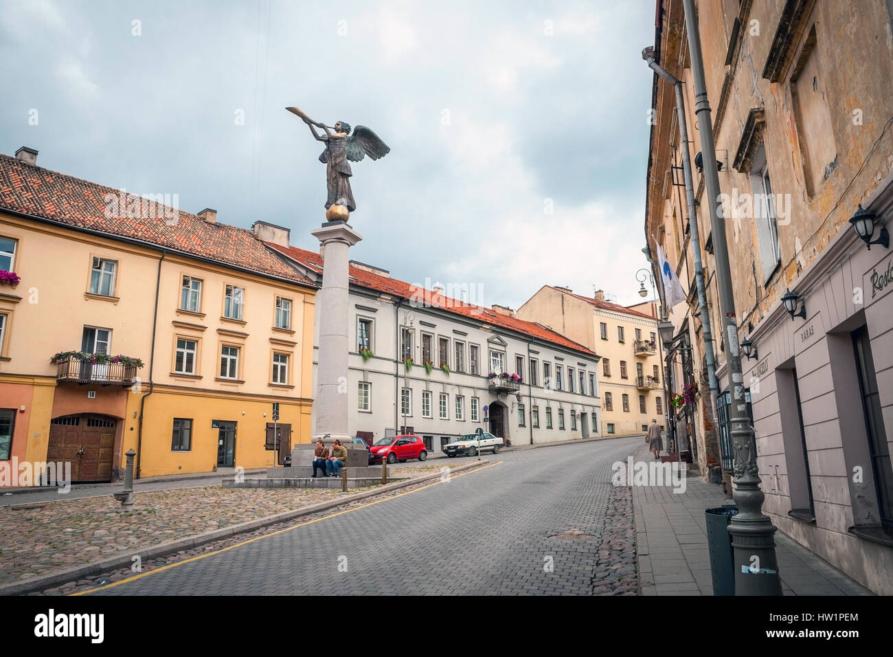 VILNIUS, LITHUANIA - JULY 12: View on historic angel statue blowing in ...