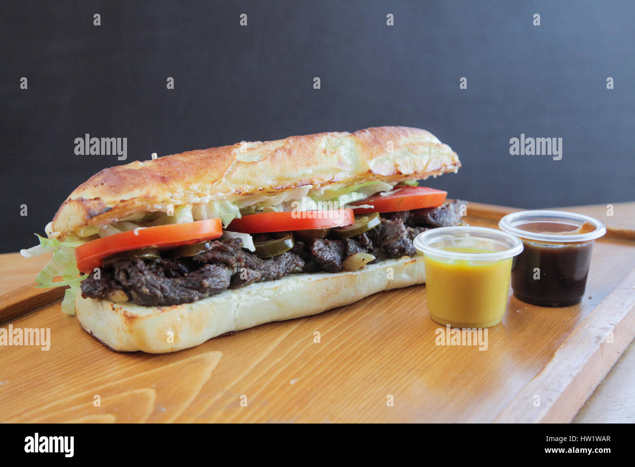 Beef steak foot long sandwich Stock Photo - Alamy