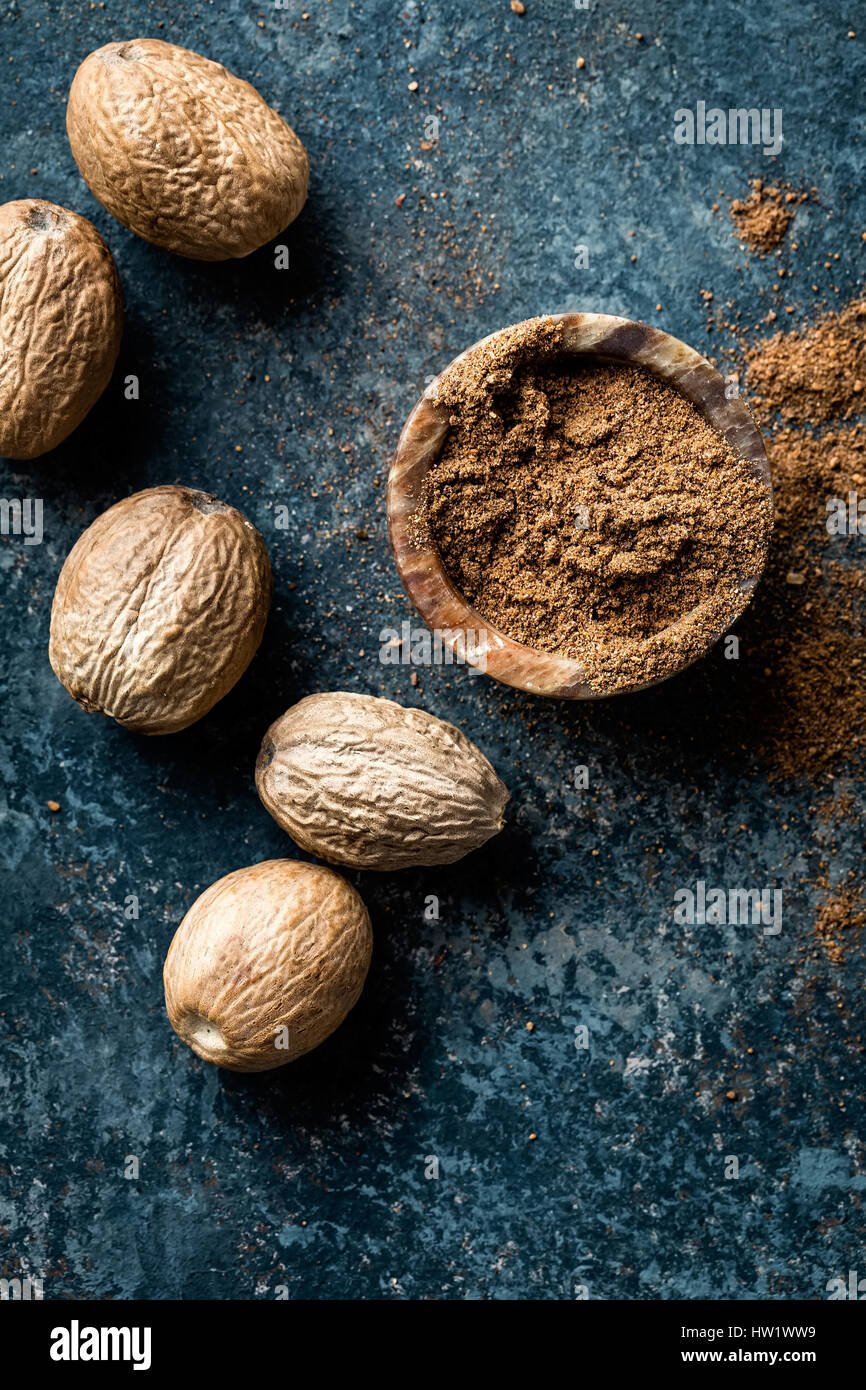 Nutmeg on dark background directly above copy space Stock Photo - Alamy