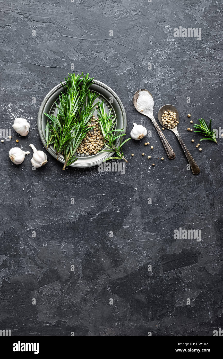 Rosemary, garlic, salt and white pepper, culinary background with ...
