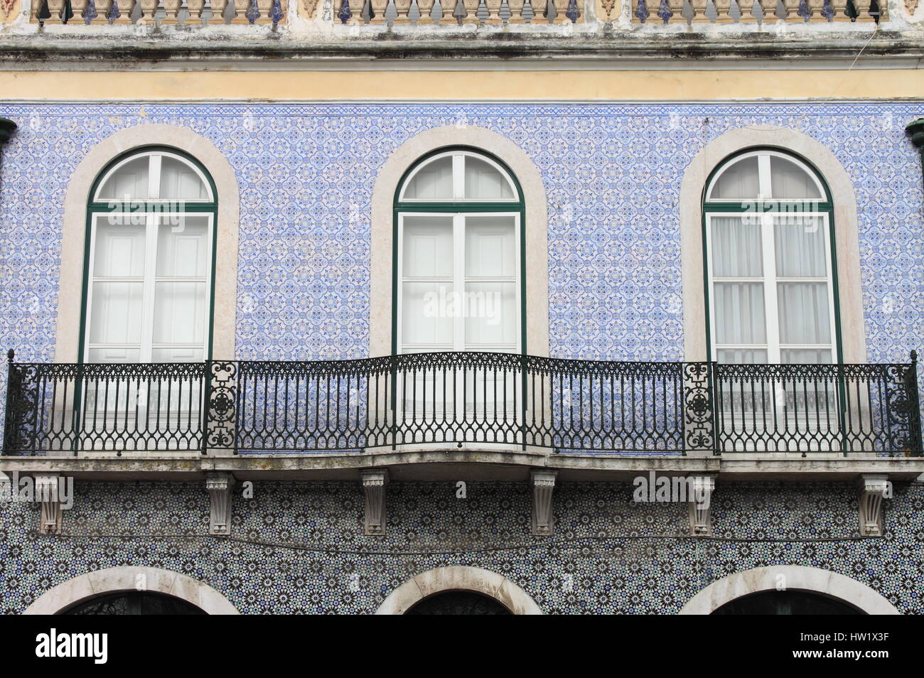 Typical portuguese windows with azulejo tiles Stock Photo - Alamy