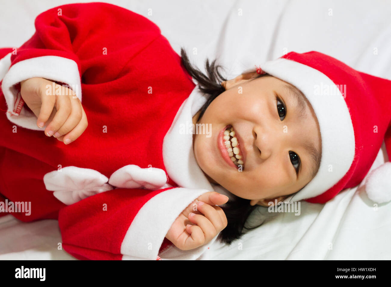 Asian Chinese santa girl in white background Stock Photo - Alamy