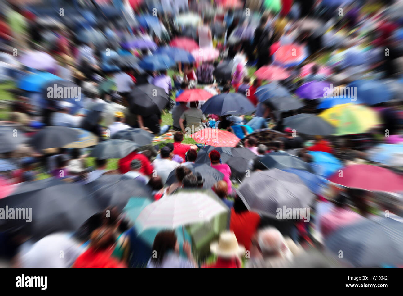 Person in focus in blurred crowd hi-res stock photography and images ...
