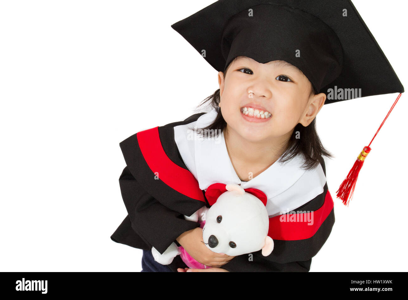 Chinese little girl graduation in white backround studio shot Stock ...