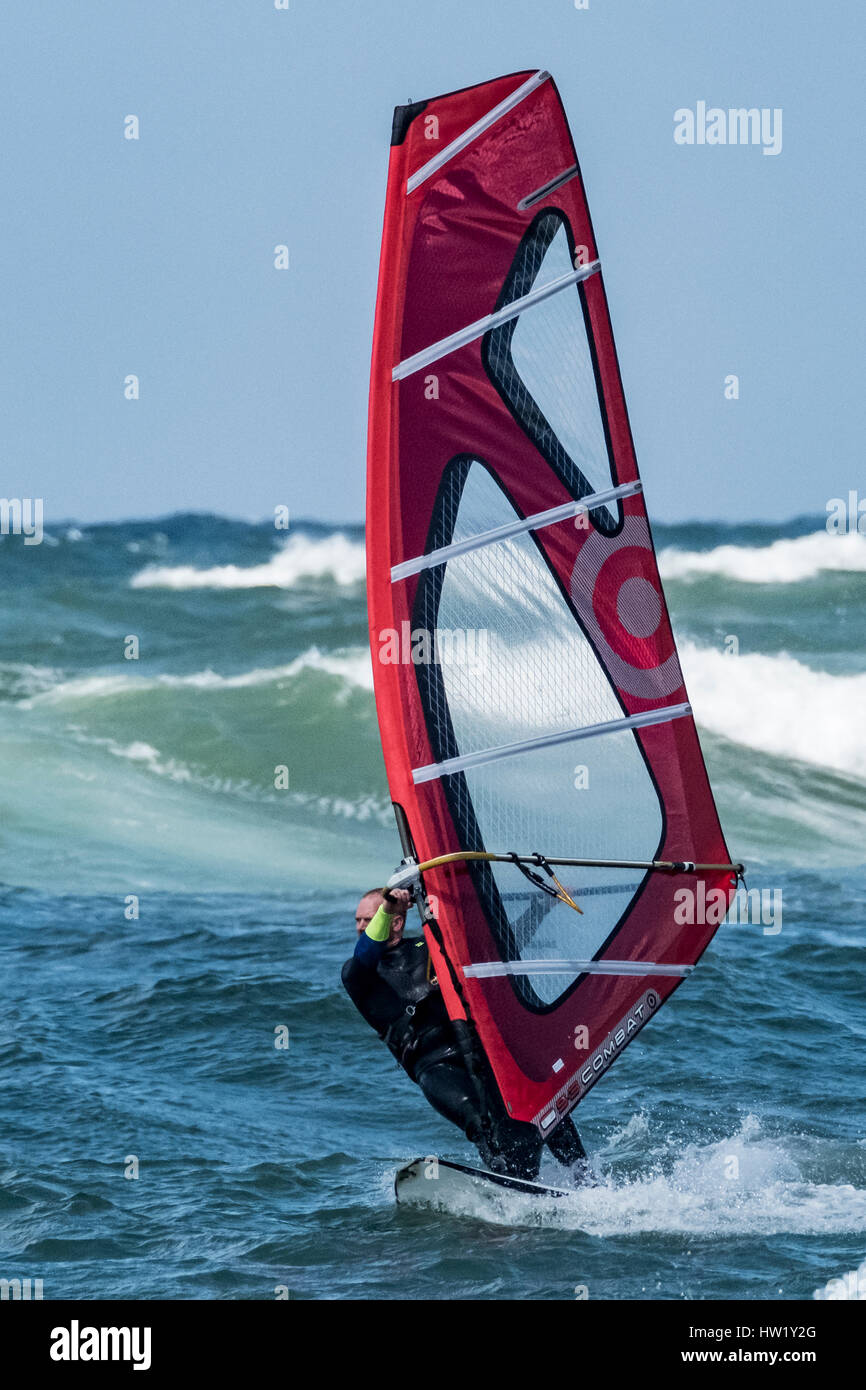 A windsurfer in Klitmoller which is a popular windsurfing destination ...