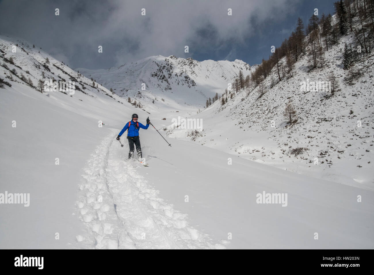 Ski tourers exploring the mountains of the Villgratental in Ost Tirol ...
