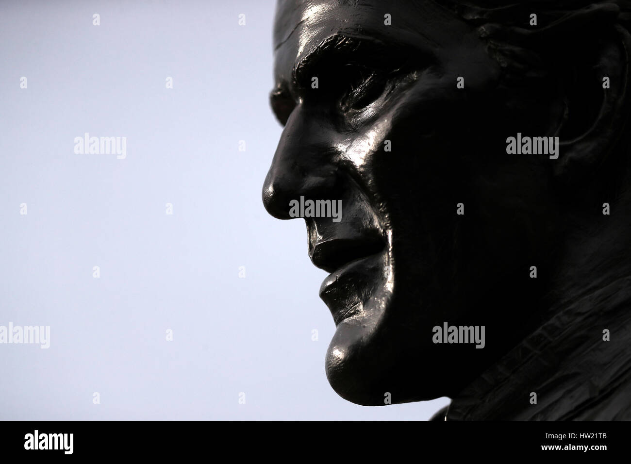 The newly unveiled AP McCoy statue in silhouette during Champion Day of ...
