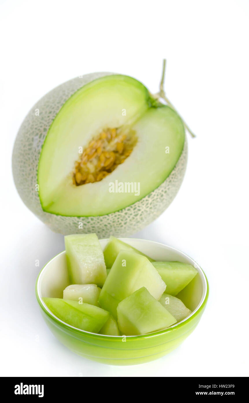 shopped green melon isolated on white background Stock Photo - Alamy