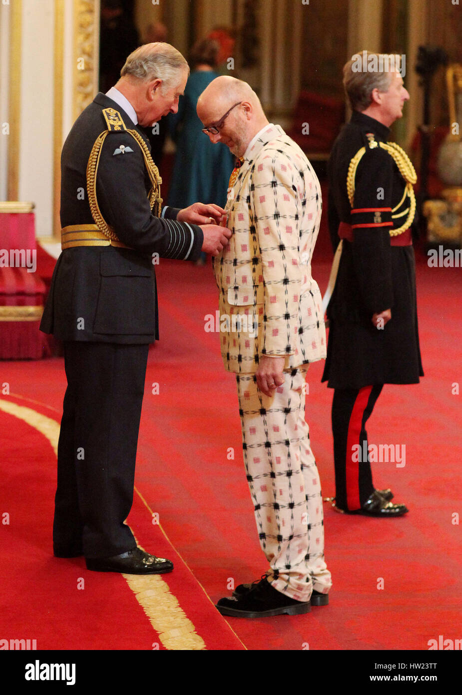 Artist Patrick Brill is made an OBE by the Prince of Wales during an ...