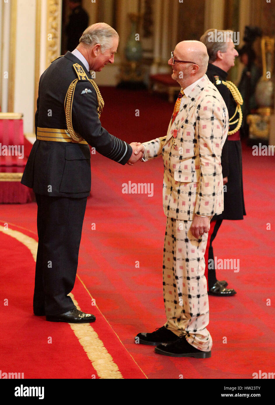 Artist Patrick Brill is made an OBE by the Prince of Wales during an ...