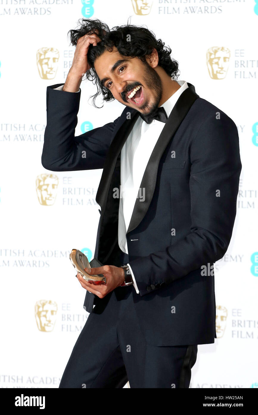 Dev Patel, winner of the best supporting actor award, poses in the ...