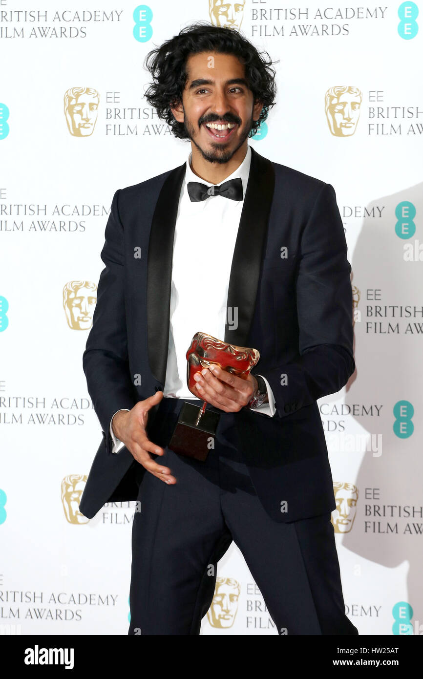 Dev Patel, winner of the best supporting actor award, poses in the ...