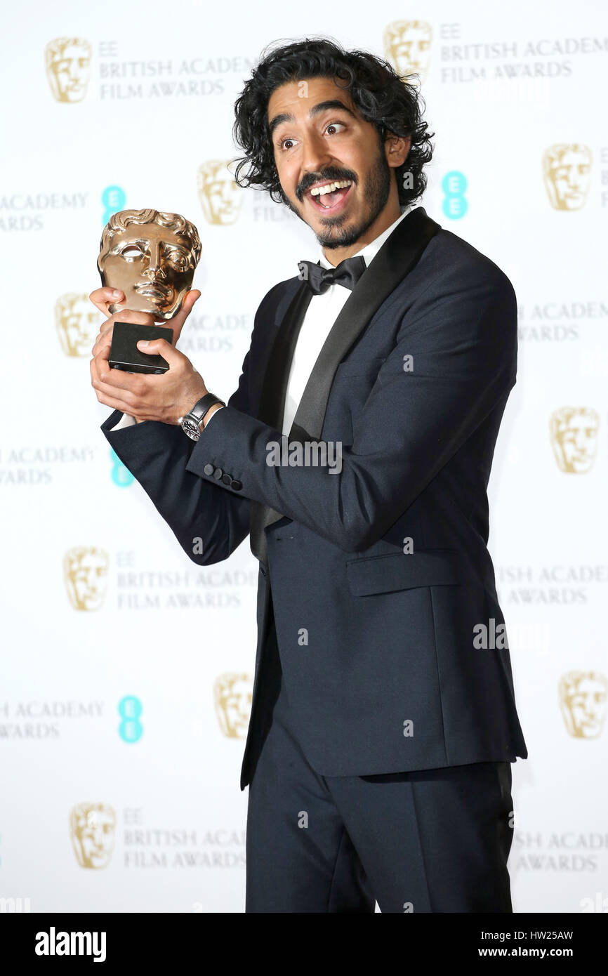 Dev Patel, winner of the best supporting actor award, poses in the ...