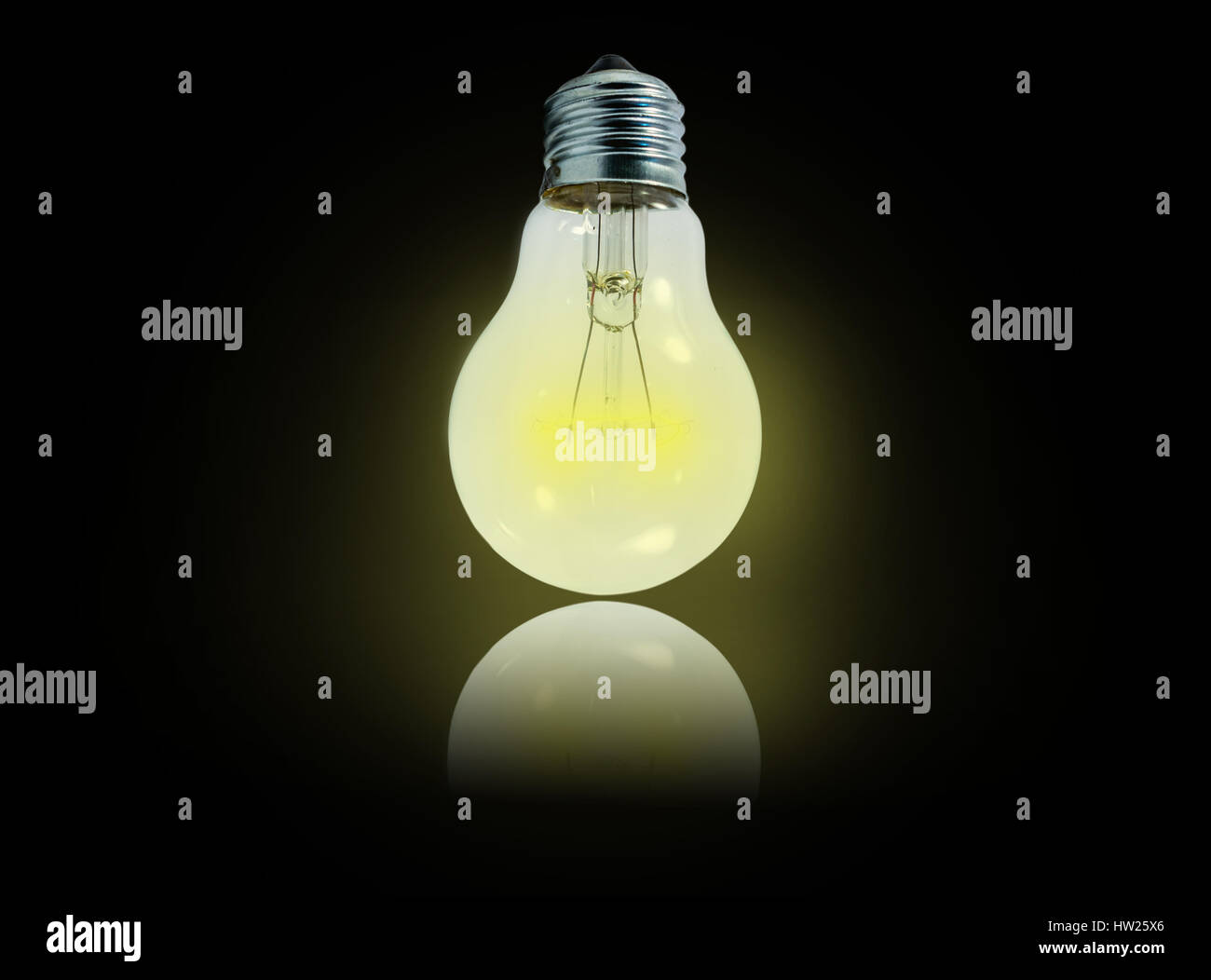 Illuminated light bulb Stock Photo - Alamy