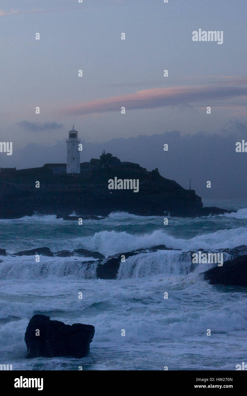 Lighthouse in breaking waves hi-res stock photography and images - Alamy