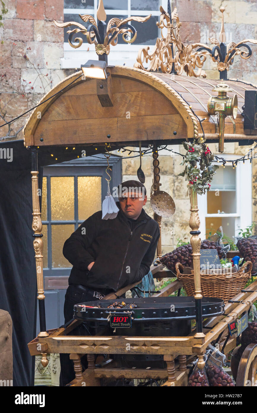 Winchester Christmas Market - Stall trader on costermonger cart selling ...