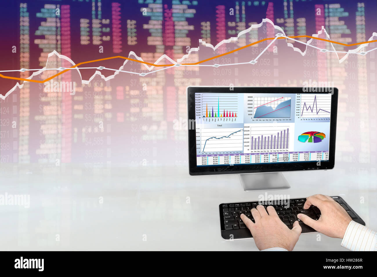 Man analyzing financial data and charts on computer Stock Photo - Alamy