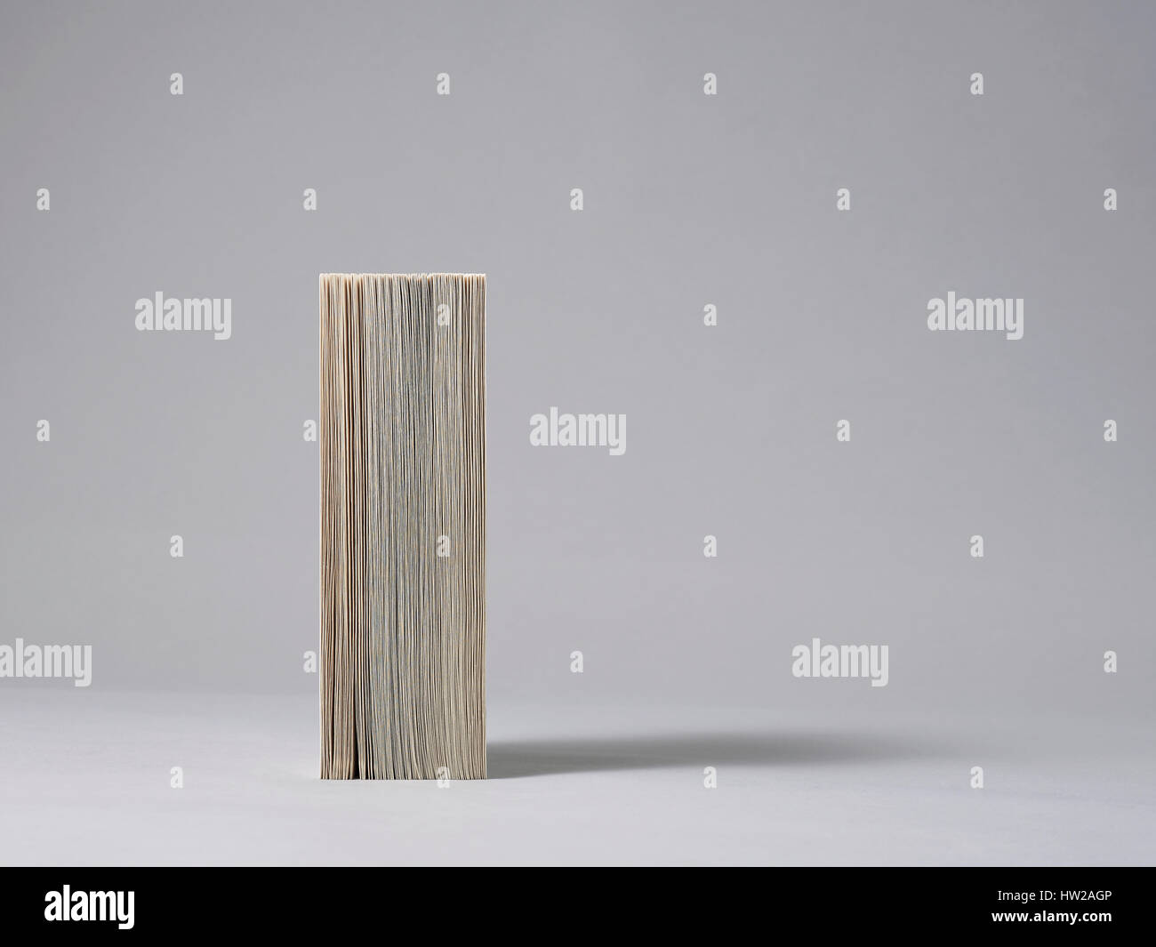 pages of a book on a grey background Stock Photo - Alamy