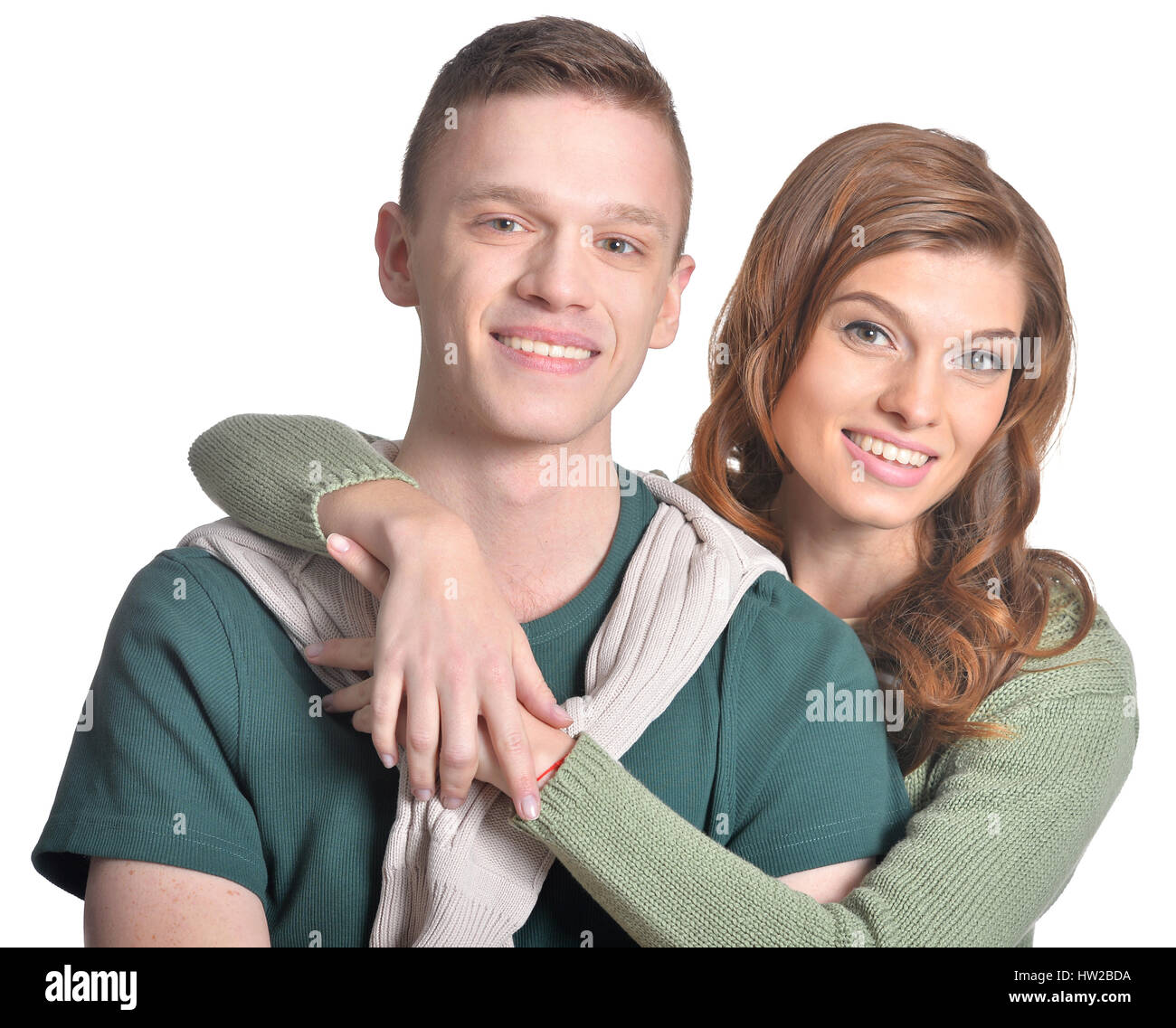 Beautiful young couple on a white background Stock Photo - Alamy