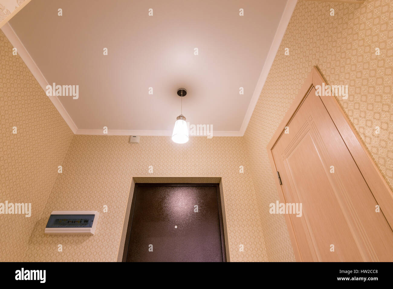 View of the ceiling in the hallway small apartment Stock Photo - Alamy