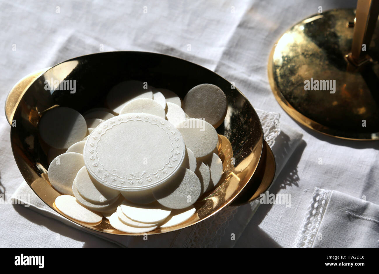 many consecrated Host during the Mass of first communion Stock Photo ...
