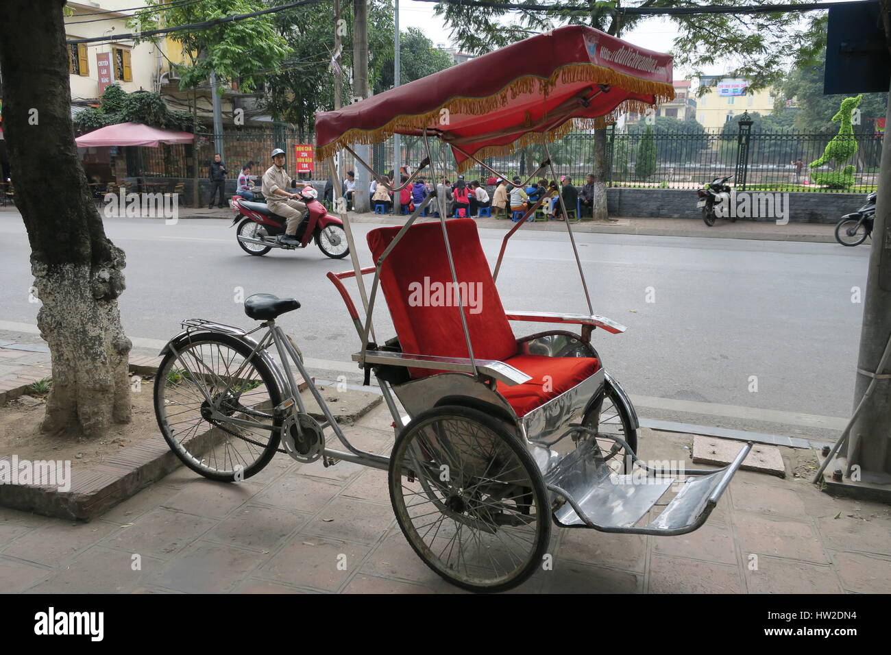 Bicycle rickshaw taxi tricycle in Hanoi, Vietnam Stock Photo - Alamy