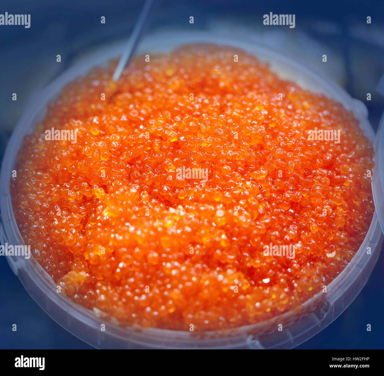 A large bucket of red caviar photographed in close-up Stock Photo - Alamy
