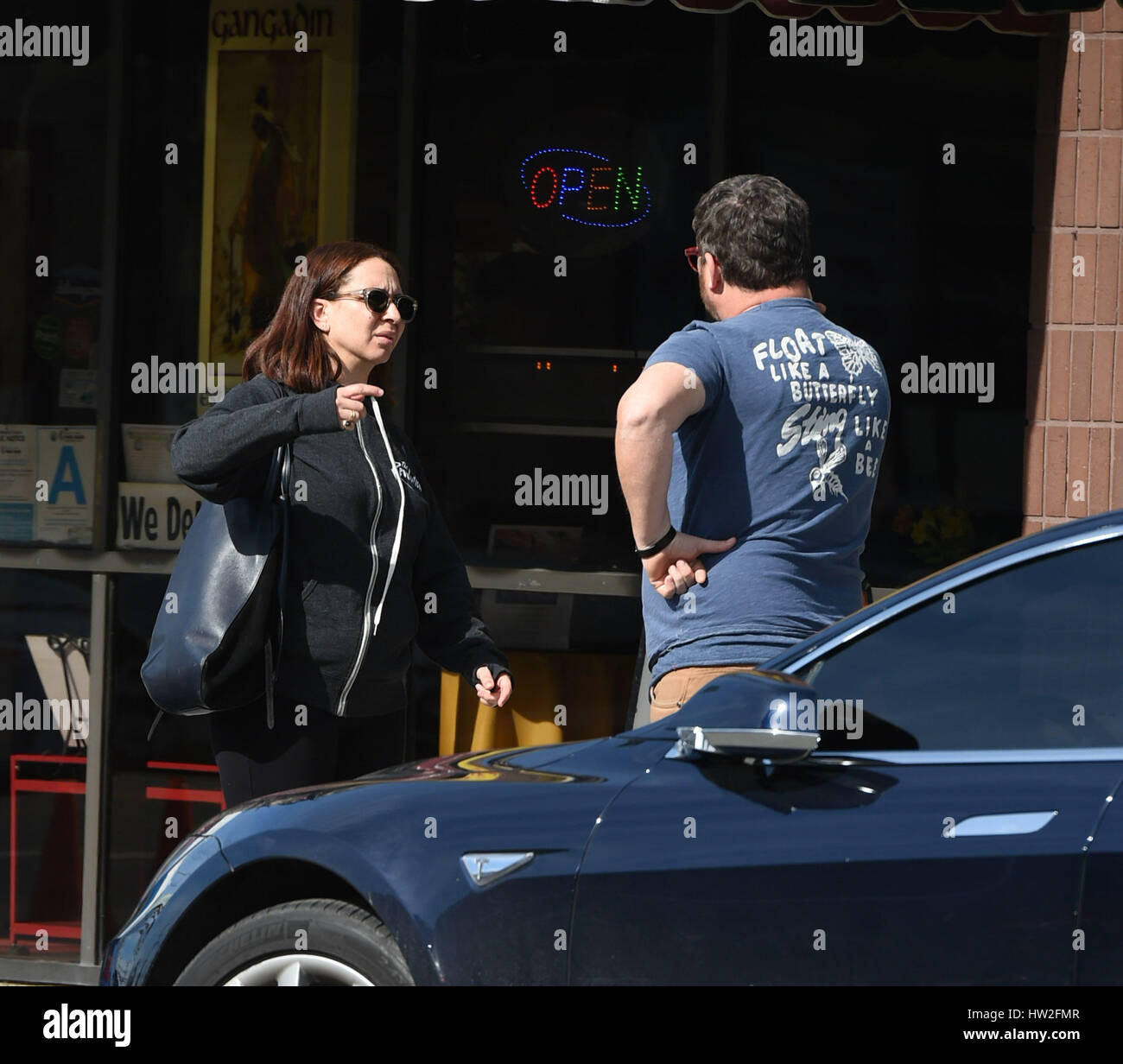 Maya Rudolph has an animated improv conversation with a friend ...