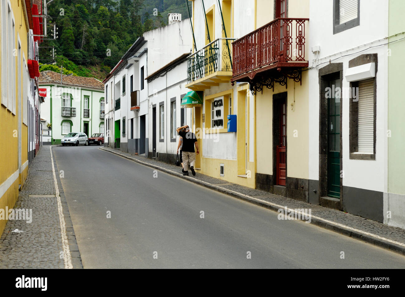 Houses along street in small town of Furnas, Sao Miguel Island, Azores ...