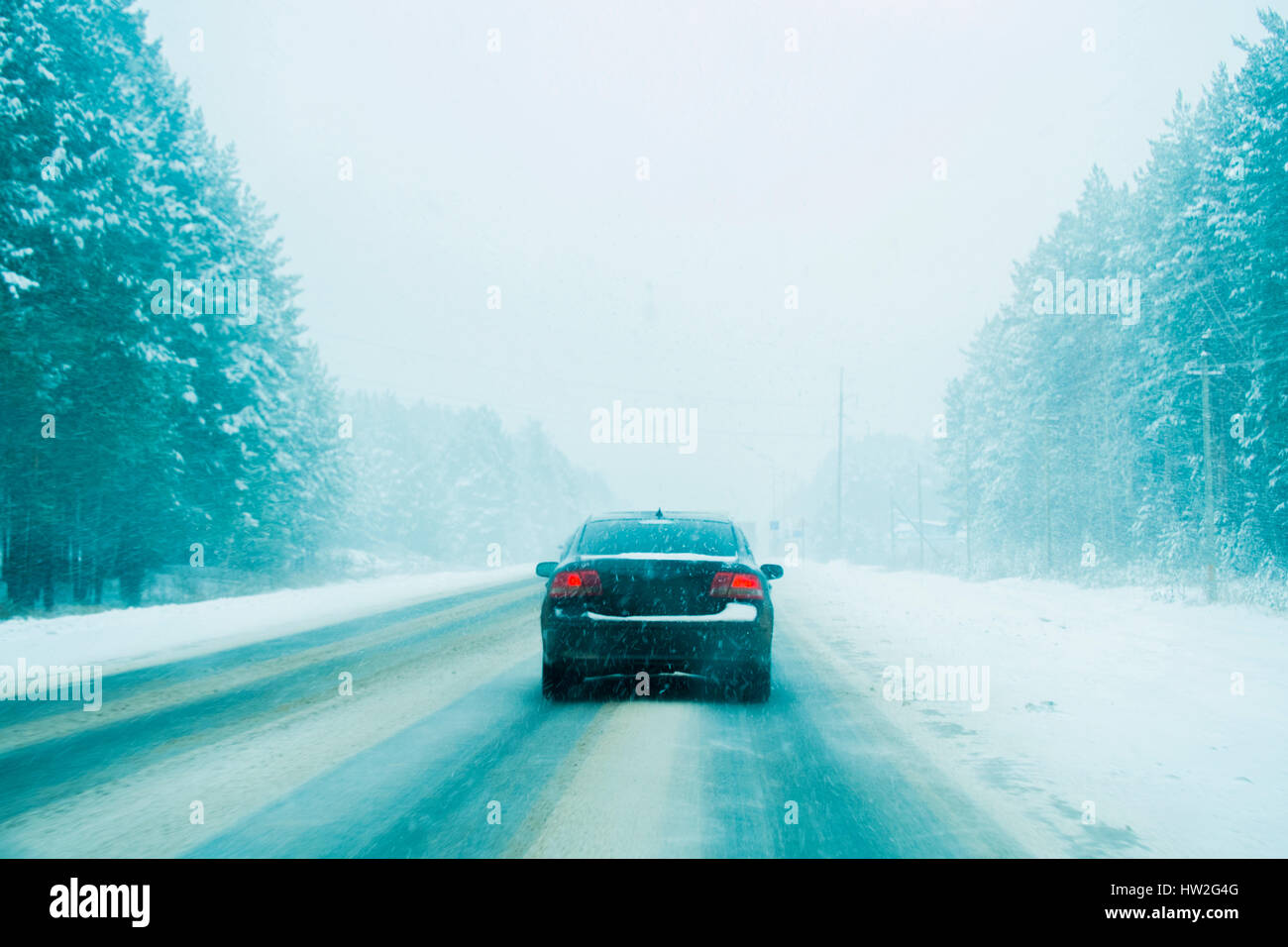 Driving on highway in winter hi-res stock photography and images - Alamy