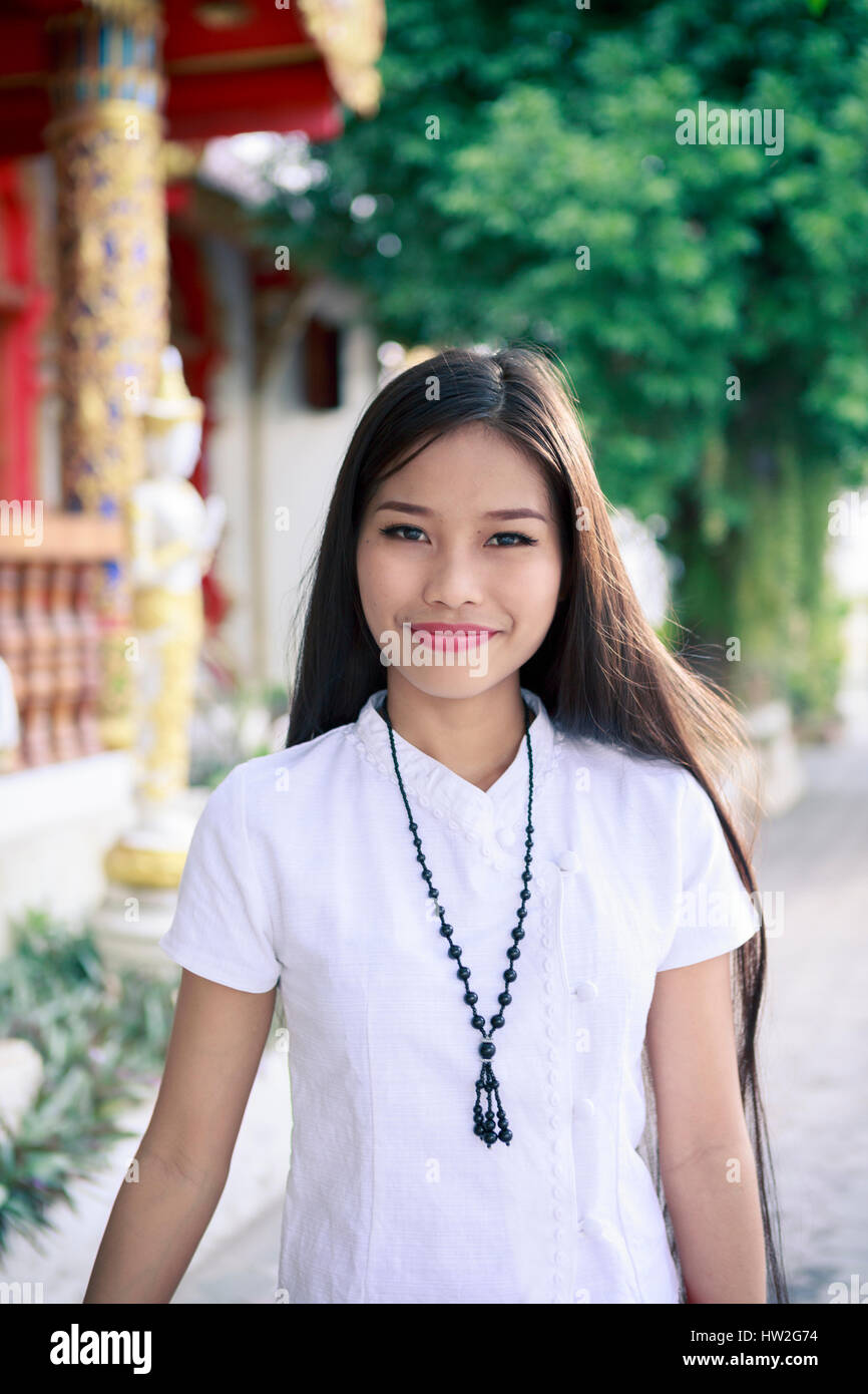 Portrait of smiling Asian woman Stock Photo - Alamy