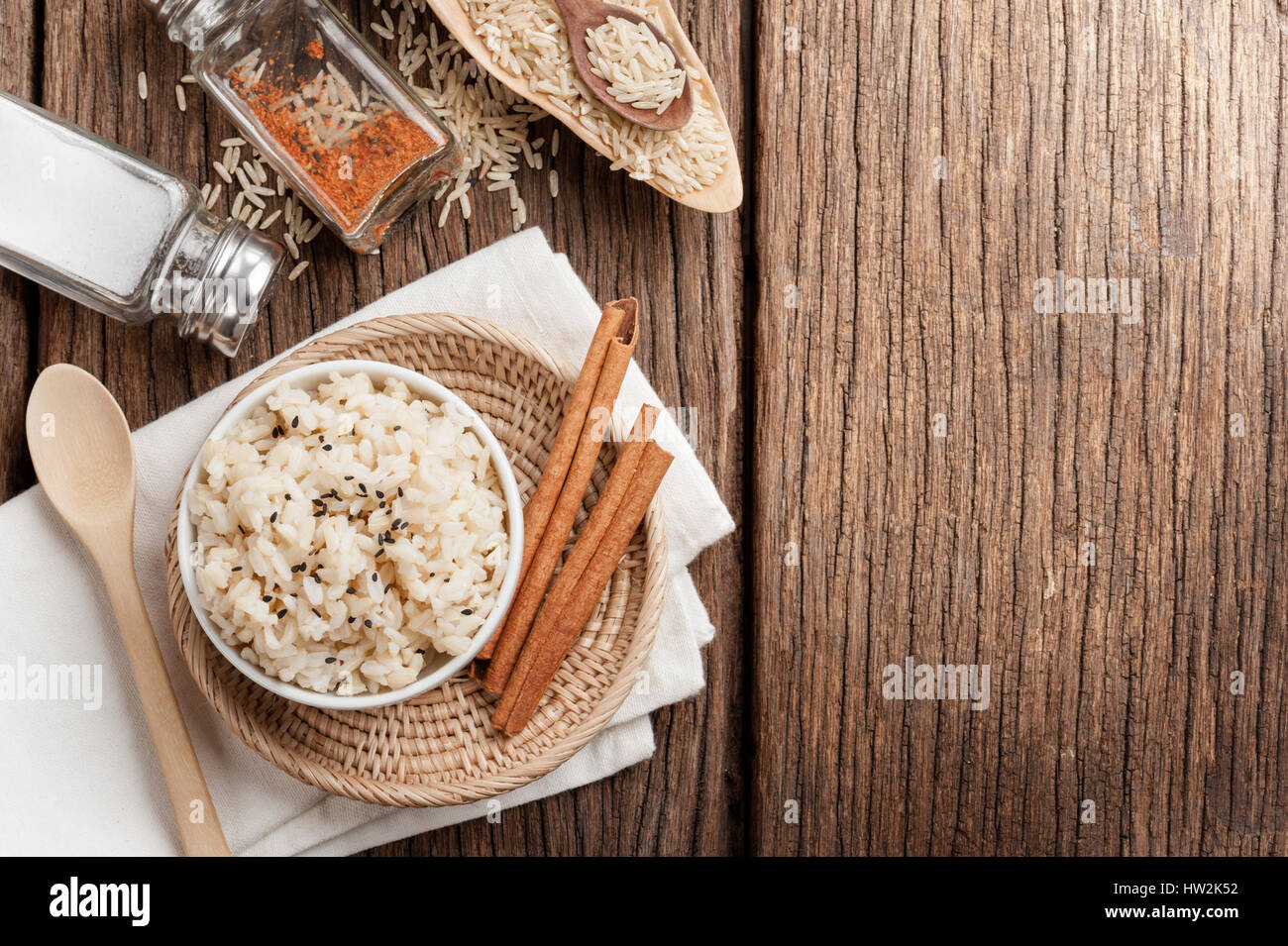 cooked brown rice in white bowl, healthy eating Stock Photo - Alamy