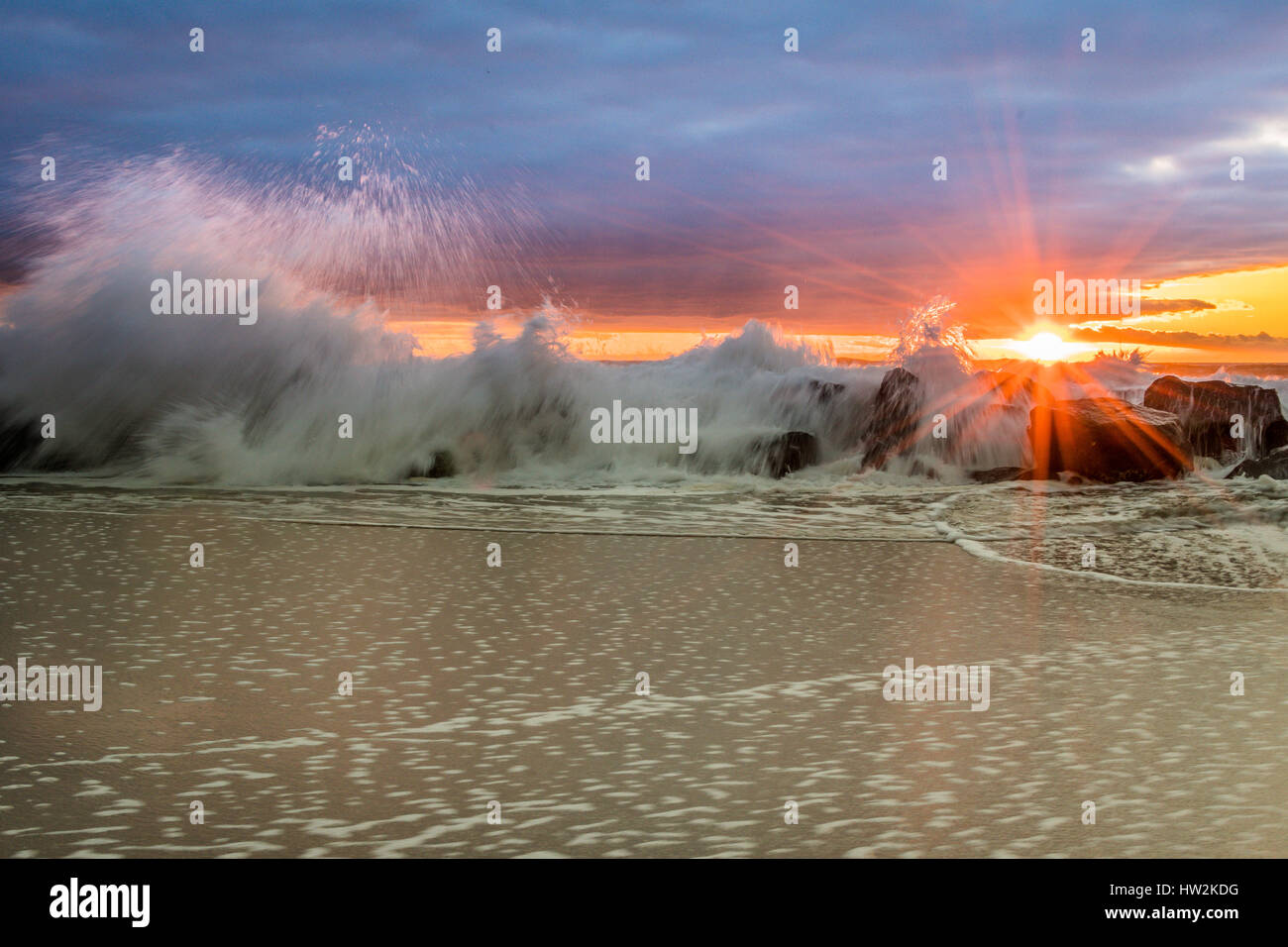 Sun rising on a windy day Stock Photo - Alamy