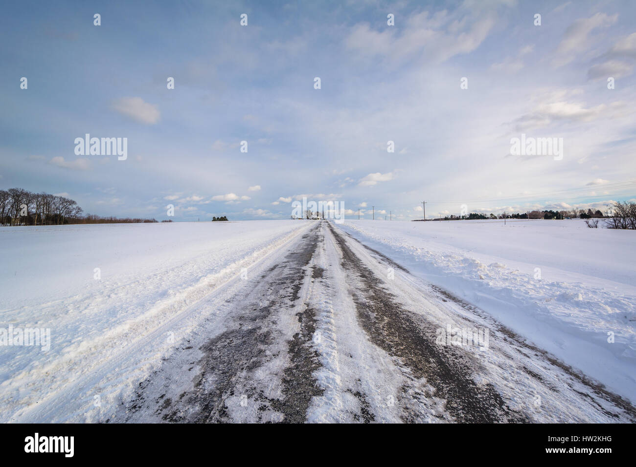 Snow covered road in a rural area of York County, Pennsylvania Stock ...
