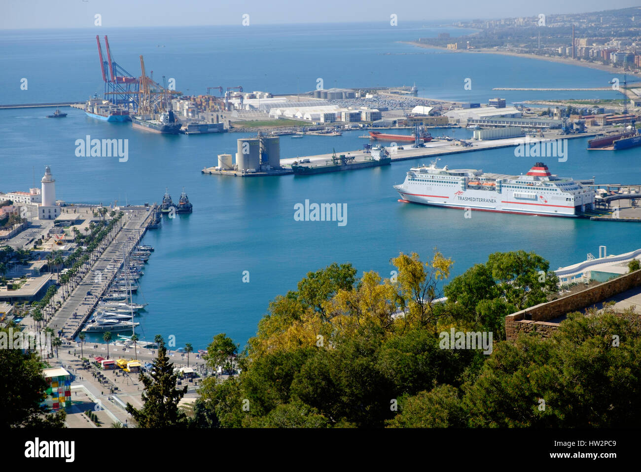 View over Malaga Harbor at sunset Andalusia Spain Stock Photo - Alamy