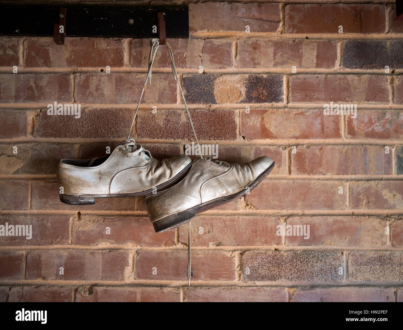 Hanging boots hi-res stock photography and images - Alamy