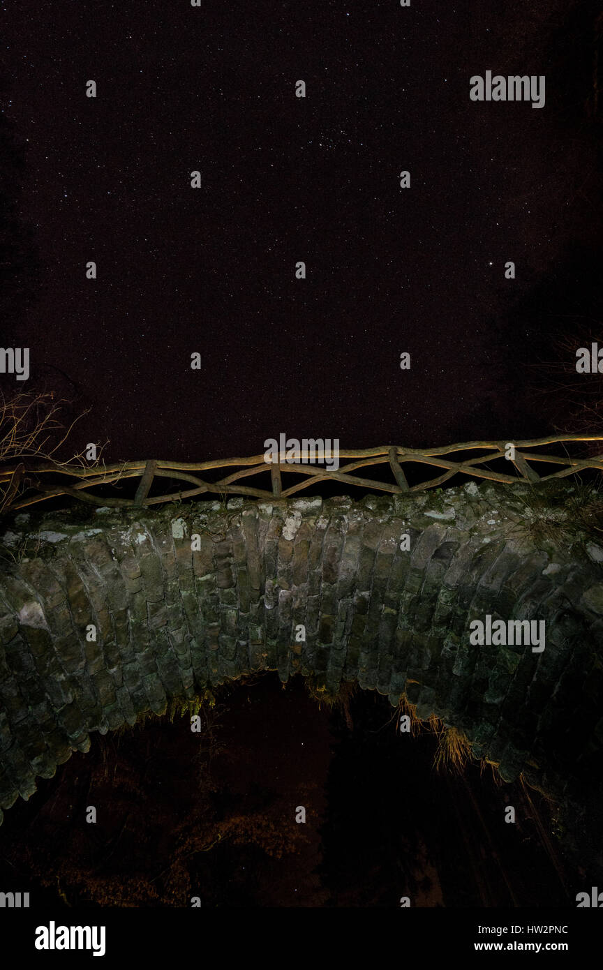 Old stone bridge and starry sky Stock Photo - Alamy