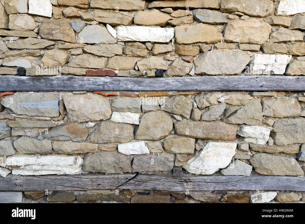 Stone wall texture with timbers Stock Photo - Alamy