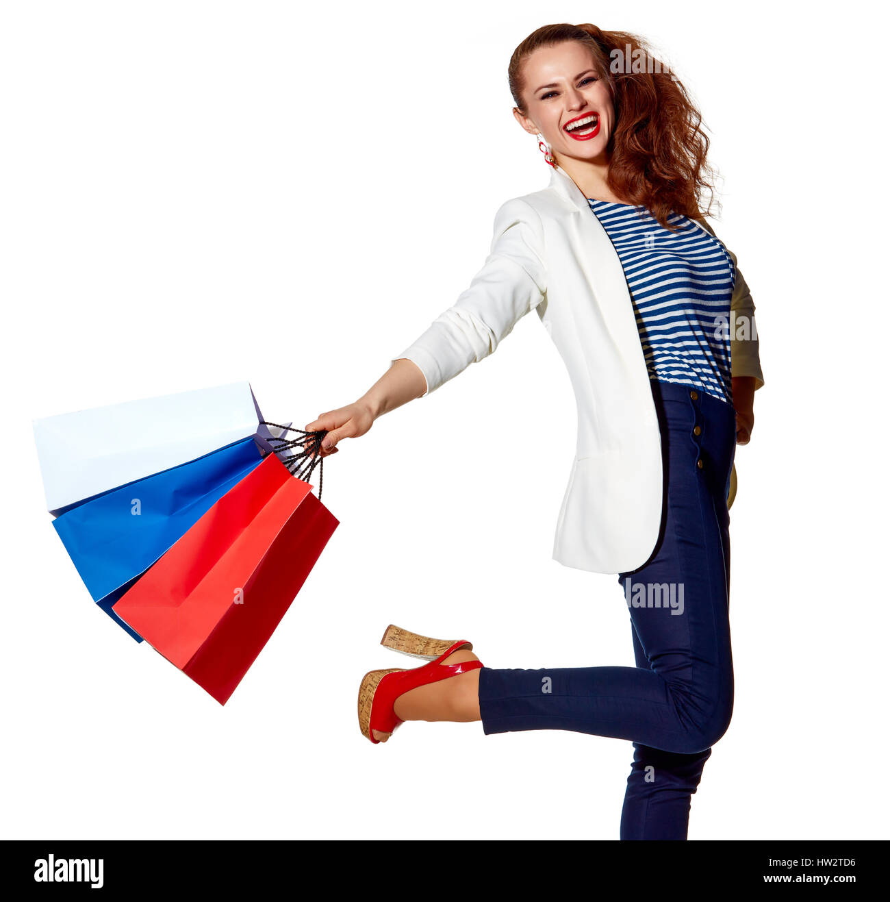 Shopping. The French way. Full length portrait of smiling young woman ...