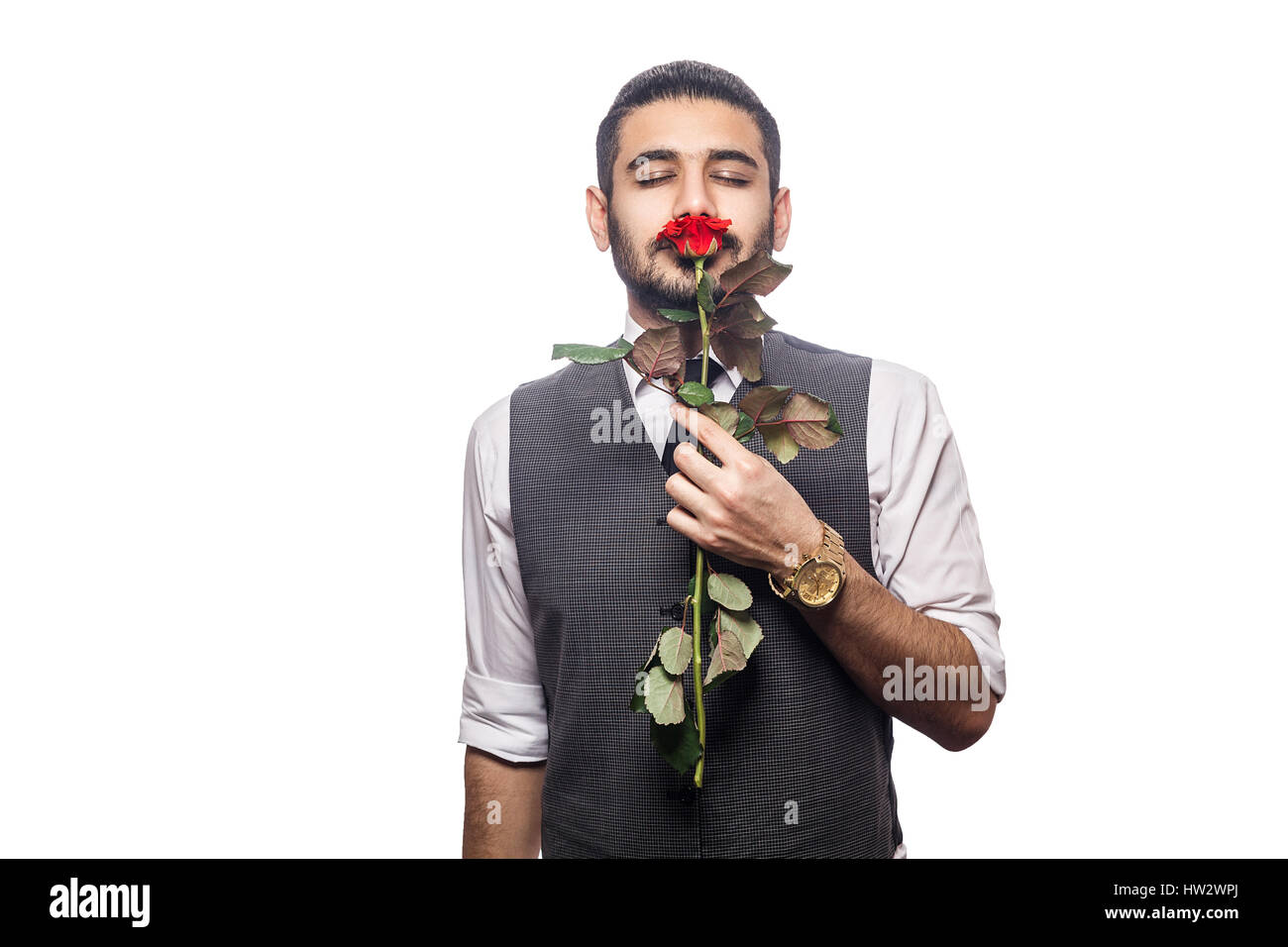 Handsome romantic happy man with rose flower. studio shot. isolated on ...