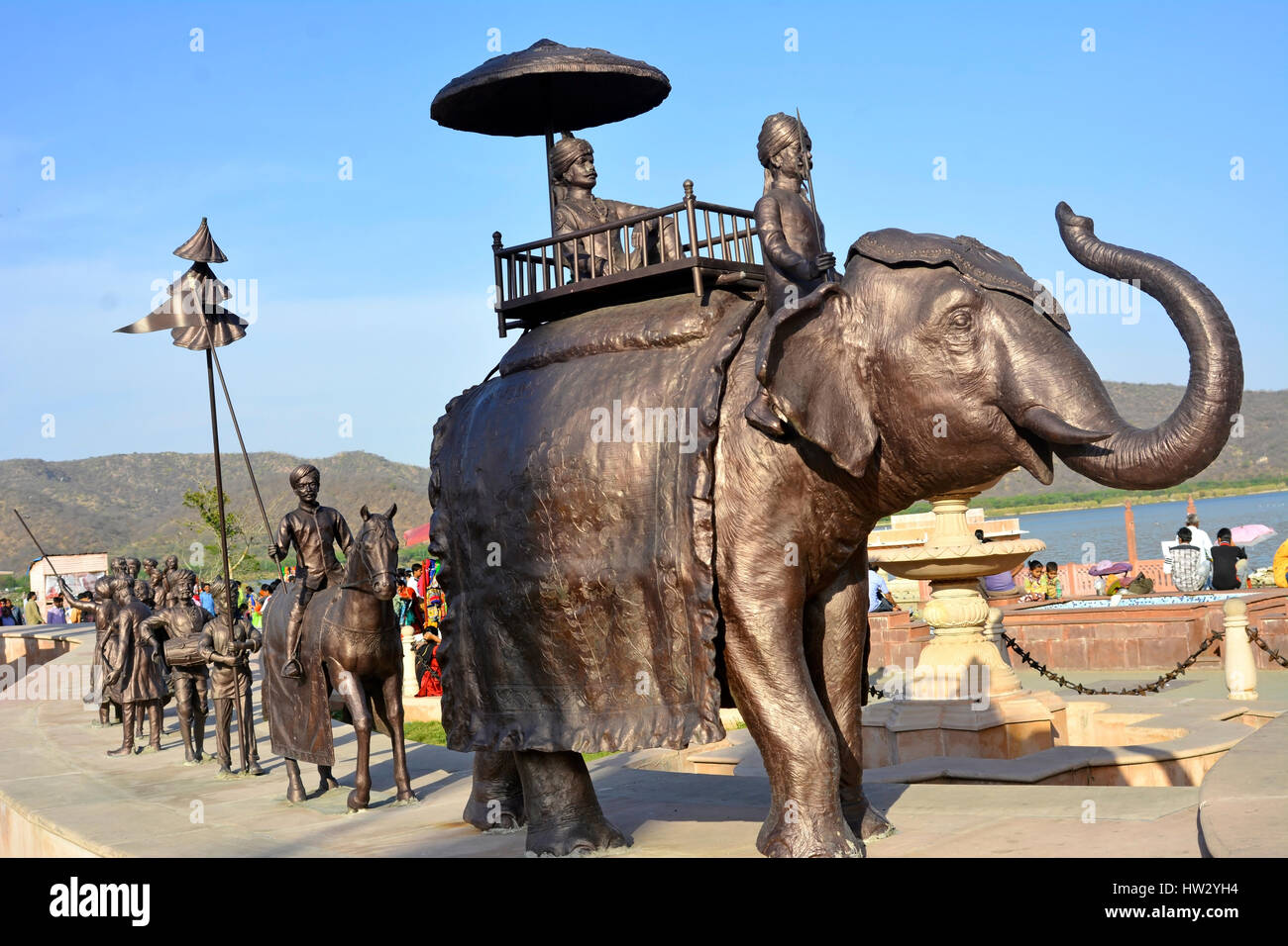 The Statue of King on Elephant with his army at Jal Mahal Stock Photo ...