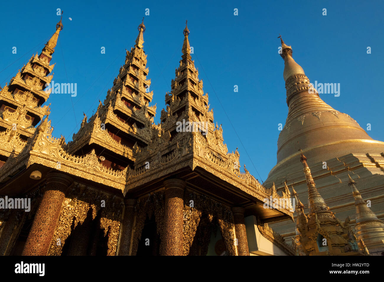 Close-up of the spires and gilded stupa on the Shwedagon Pagoda in ...