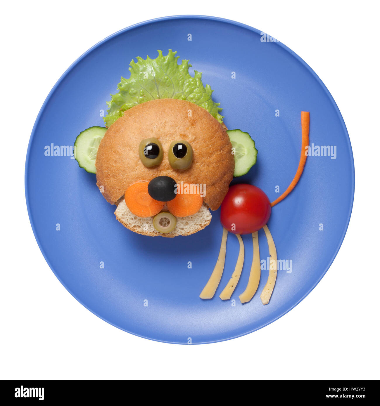 Cub made of bread and vegetables on blue plate Stock Photo - Alamy